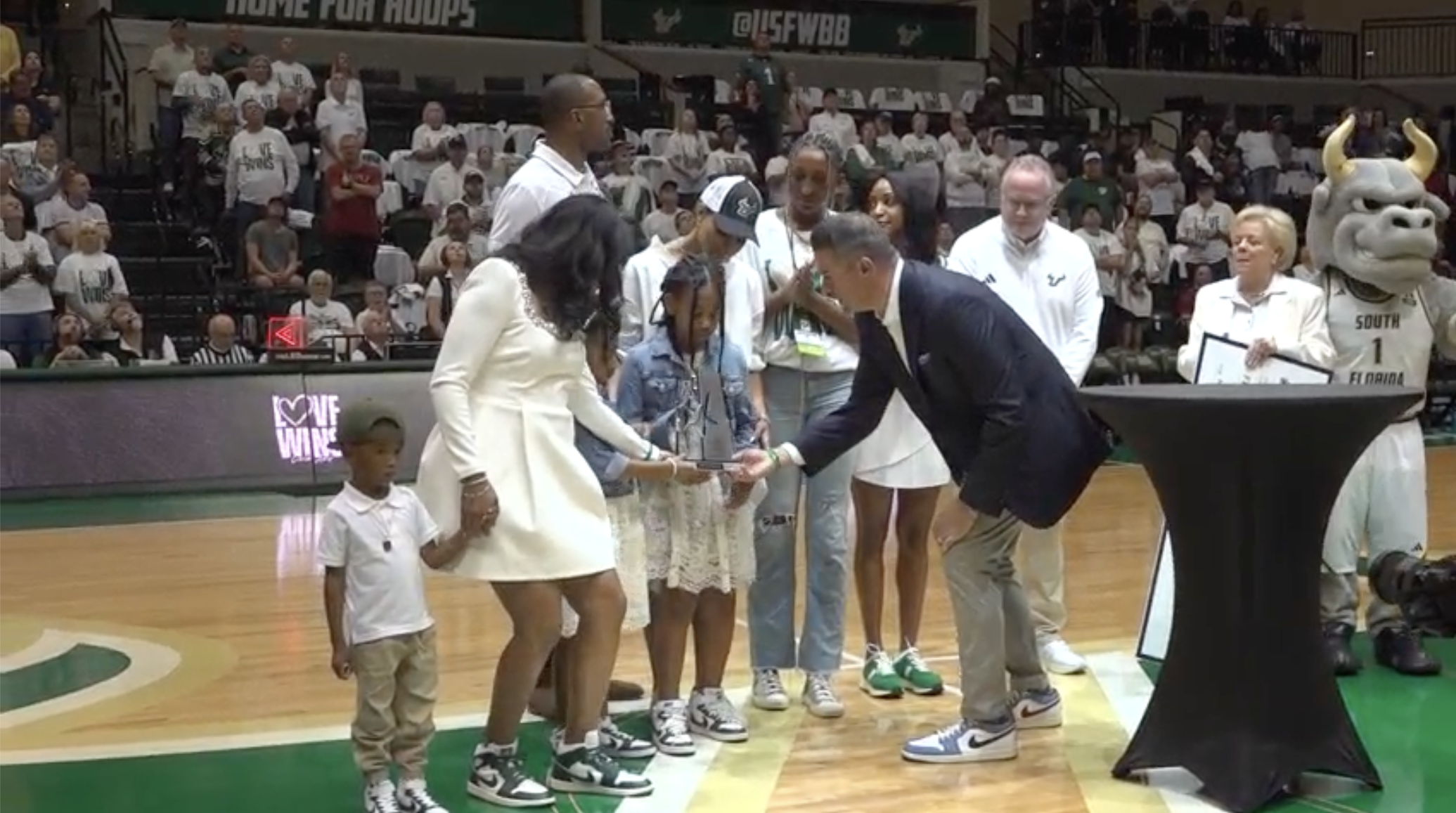 USF Coach Abdur-Rahim’s family receives ‘coach of the year’ award in ...